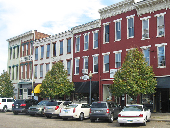 Schaffer's Food Market anchors this stretch of historic storefronts, where small-town commerce thrives without the pretension or prices of big-city shopping districts.