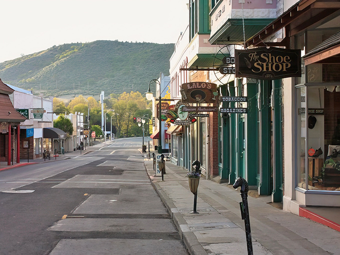 Miner Street stretches toward the mountains like a postcard from simpler times, where parking spots outnumber traffic jams and the pace slows to human scale.