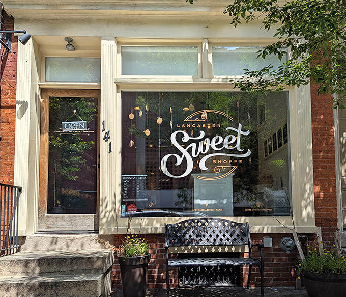 That classic red brick charm practically whispers "come inside for something extraordinary" before you even reach the door.