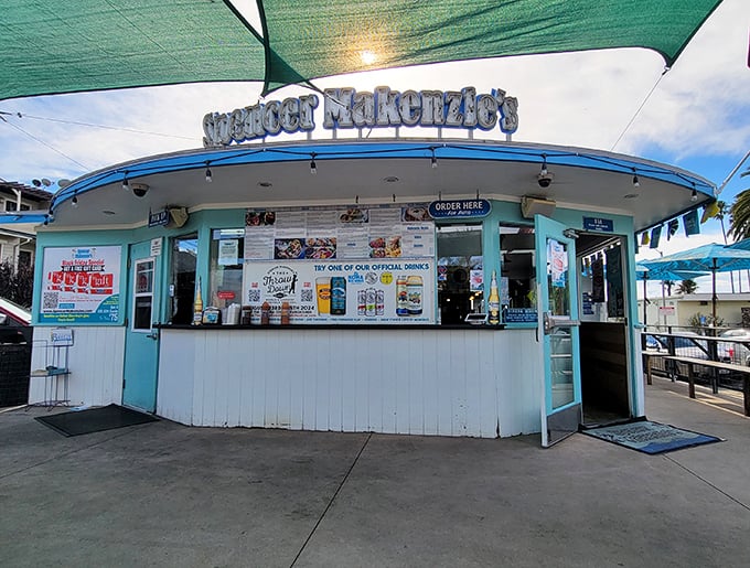 The turquoise-trimmed beacon of seafood salvation beckons hungry travelers with its bold promise of "World Famous Fish Tacos" – a claim you'll soon agree is no exaggeration.