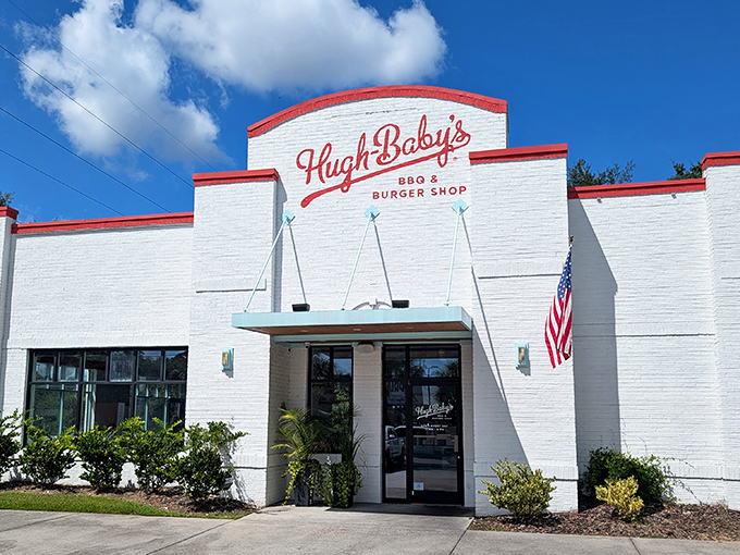 The white brick exterior with that bold red trim isn't just eye-catching&mdash;it's a promise of the no-nonsense deliciousness waiting inside this Charleston gem.