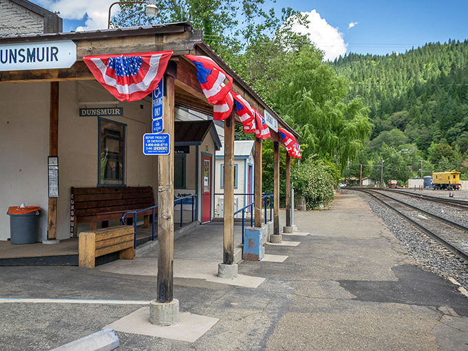 The Dunsmuir train station, where patriotic bunting meets mountain views, offering a Norman Rockwell scene that Instagram filters try desperately to recreate.