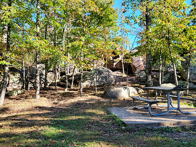 Nature's own sculpture garden: massive pink granite boulders stand sentinel against a brilliant blue Missouri sky, inviting explorers of all ages.