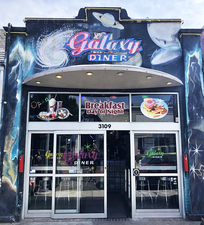 That cosmic exterior mural isn't just decoration &ndash; it's a promise of stellar comfort food waiting inside.
