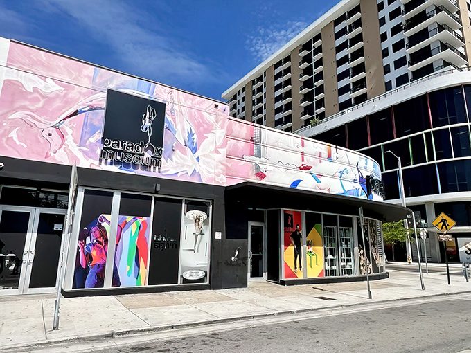 The vibrant exterior of Paradox Museum Miami stands out like a psychedelic dream in the Wynwood Arts District. Reality-bending adventures await inside!