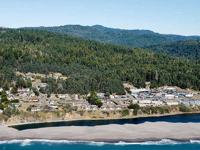 Gualala’s hillside homes and seaside streets sit between forested ridges and a sandy shoreline where river meets ocean.