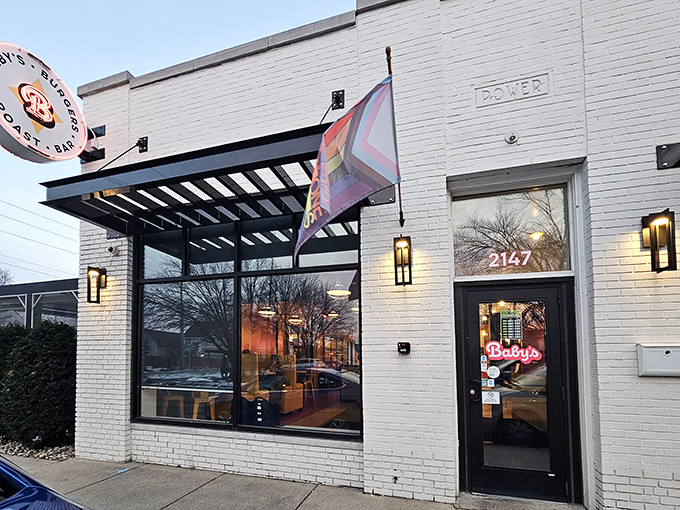 As dusk settles, Baby's neon sign glows with a welcoming pink warmth that says, "Yes, the calories are worth it" before you even step inside.