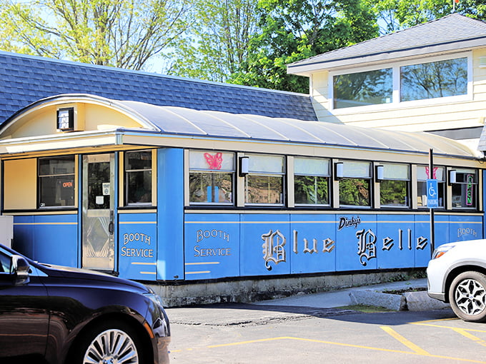The iconic blue exterior of Dinky's Blue Belle Diner gleams in the sunlight, a vintage Worcester Lunch Car that's been serving up breakfast dreams for generations.