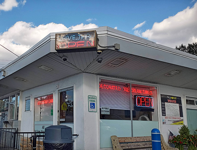The neon glow of "OPEN" against a twilight sky&mdash;nature's way of saying it's officially ice cream o'clock in Philadelphia.
