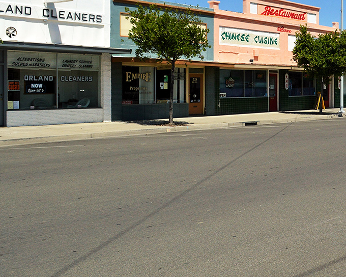 Downtown Orland's vintage storefronts tell stories of simpler times, where Orland Cleaners stands alongside the promise of Chinese cuisine &ndash; small-town charm personified. 