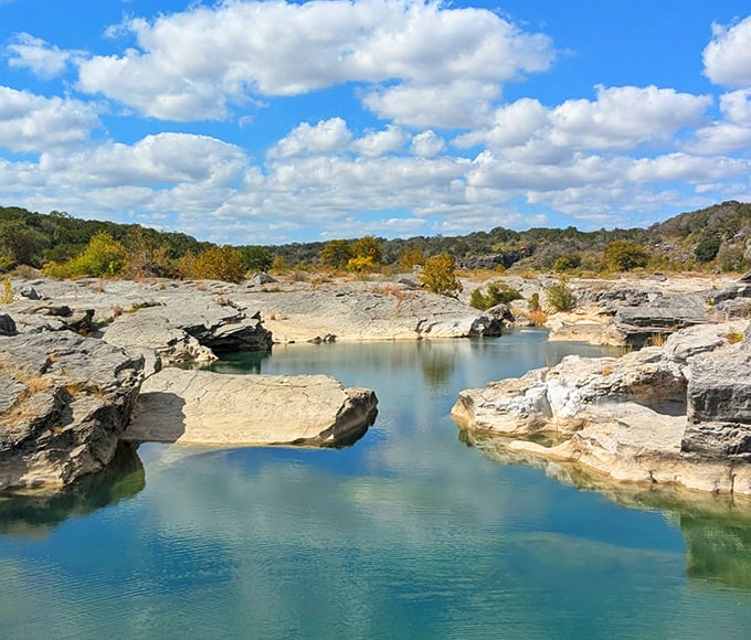 Nature's own infinity pool! The limestone steps of Pedernales Falls create a series of tranquil blue-green pools that seem to stretch forever into the Hill Country horizon.