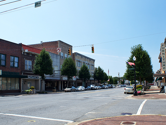 Kinston's downtown stretches before you like a Norman Rockwell painting that somehow escaped the frame. Classic brick buildings with stories to tell.