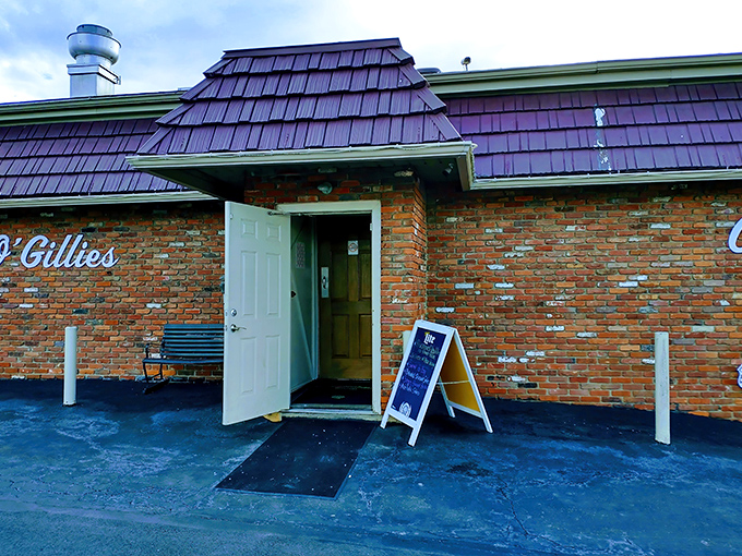 The unassuming brick exterior with its distinctive purple roof is like that quiet friend who turns out to be the life of the party.