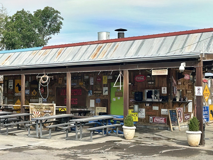 Rustic charm meets culinary magic at this unassuming roadside spot. The weathered metal roof and picnic tables promise an authentic Arizona experience without pretense.