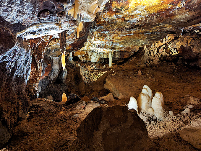 Nature's underground art gallery reveals itself in stunning detail, where stalactites and stalagmites have been performing their slow dance for millennia.