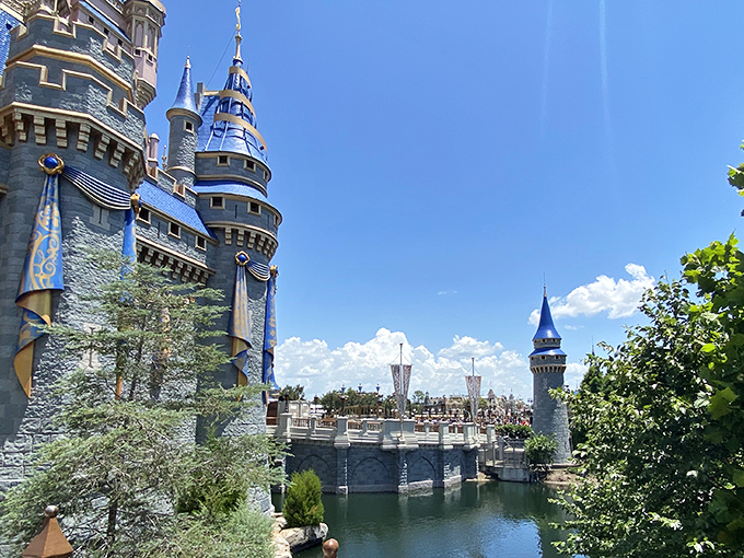 Cinderella Castle towers above its shimmering moat, where fairy tales wink at reality in true Florida magic.
