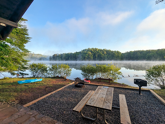 Morning mist hovers like nature's special effect over Fairy Stone Lake, creating a scene so peaceful you'll forget your phone exists.