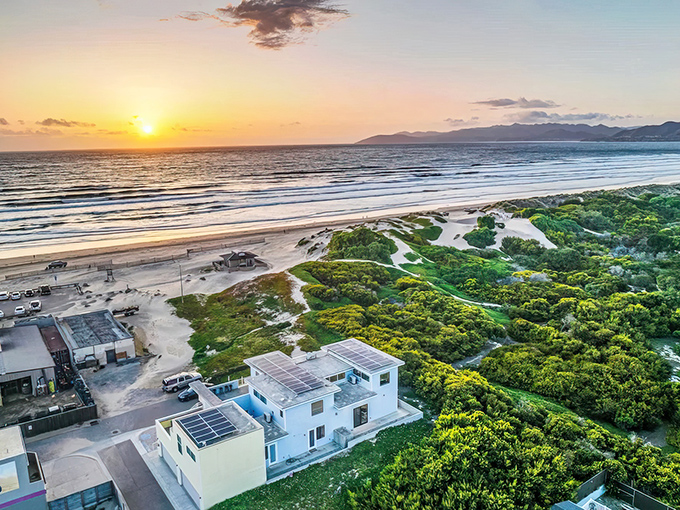 Pismo's iconic pier stretches into the Pacific like nature's welcome mat, while rolling green hills create a backdrop worthy of a desktop wallpaper.