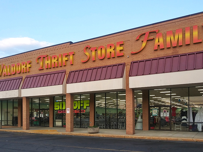 The golden lettering of Waldorf Thrift Store beckons like a siren song to bargain hunters. Treasure awaits behind those glass doors!