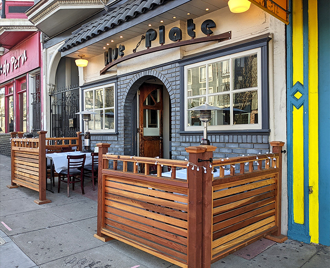 Blue Plate's charming exterior with its wooden parklet creates the perfect urban oasis for Mission District dining adventures.