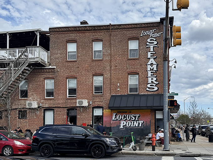 The unassuming brick exterior of L.P. Steamers stands like a seafood sentinel in Baltimore's Locust Point neighborhood, promising treasures within.