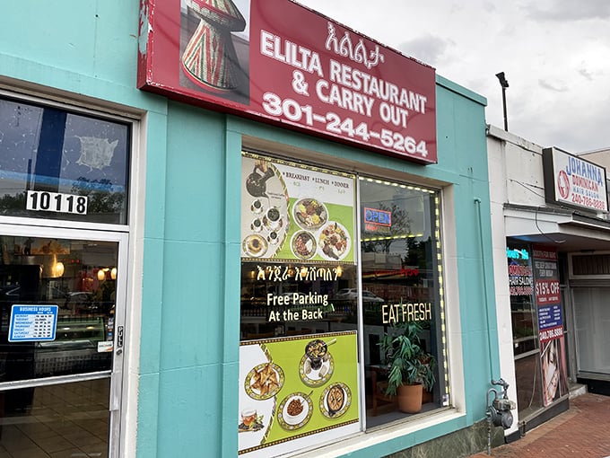 The turquoise facade of Elilta Restaurant stands out like a culinary beacon in Silver Spring, promising Ethiopian delights behind its modest storefront.