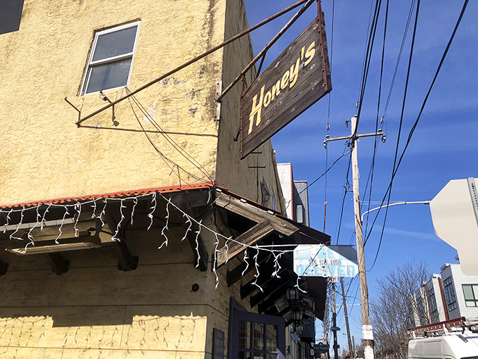 The unassuming yellow exterior of Honey's might not stop traffic, but locals know this modest sign marks the spot where breakfast dreams come true.