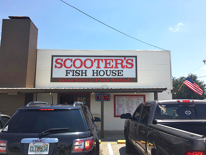 The bold red letters of Scooter's Fish House sign beckon like a lighthouse to seafood lovers navigating the hunger seas of Highway 98.