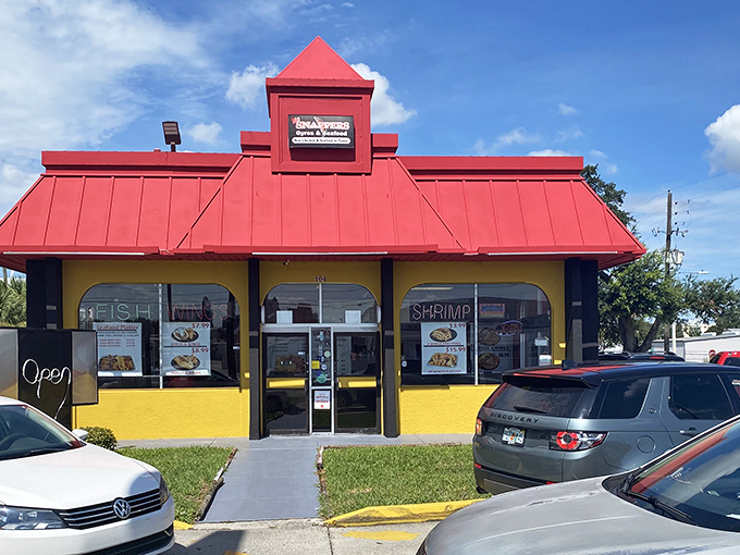 The same yellow-and-red color scheme continues during daylight hours, proving good taste doesn't need fancy architectural flourishes.