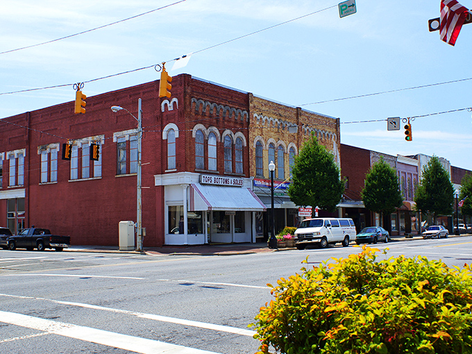 Kinston's downtown stretches before you like a Norman Rockwell painting that somehow escaped the frame. Classic brick buildings with stories to tell.