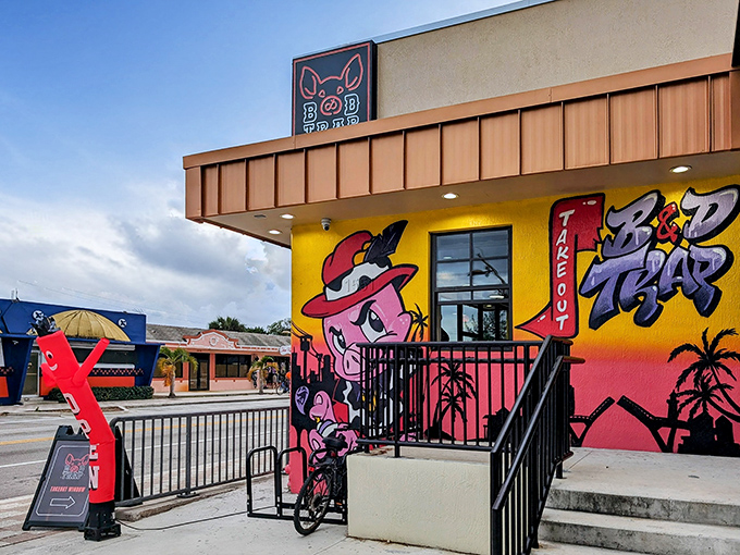 The vibrant yellow exterior with its dapper pig mascot isn't subtle, but neither is the flavor bomb waiting inside this Fort Lauderdale smoke sanctuary.