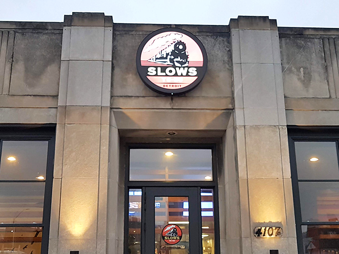 The concrete fortress of flavor stands proud on Cass Avenue, its vintage-inspired sign promising smoky treasures within. Detroit's barbecue beacon beckons.