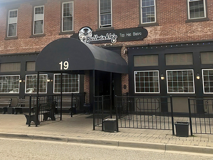 The classic black awning and elegant signage give just a hint of the culinary adventure that awaits inside Bullwinkle's Top Hat Bistro.