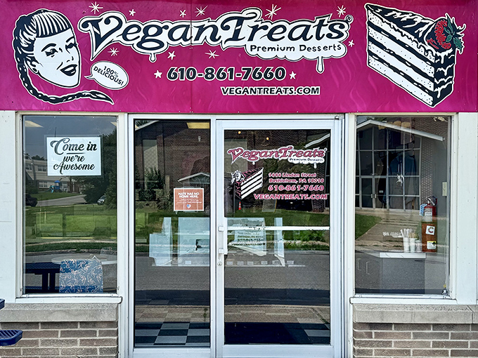 The unassuming storefront with its vibrant pink sign beckons dessert lovers like a siren call to sailors. Sweet paradise awaits inside!