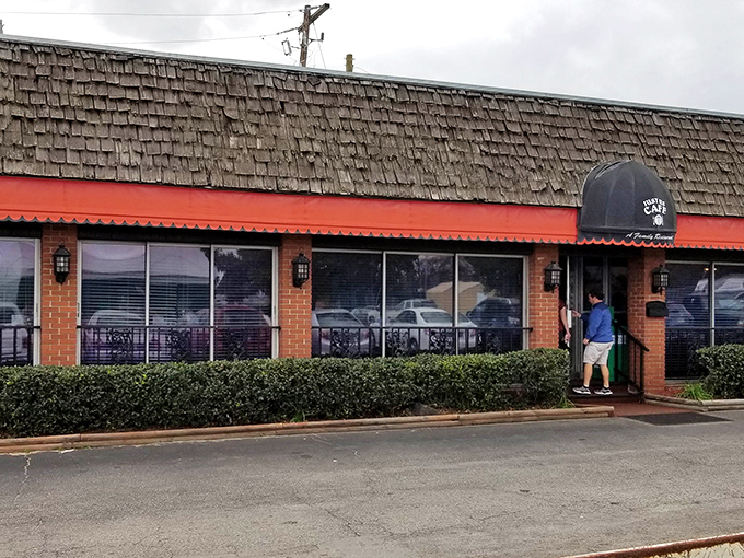 The unassuming exterior of Just Us Cafe stands like a beacon of breakfast hope along the Cayce roadside, promising delicious rewards within.