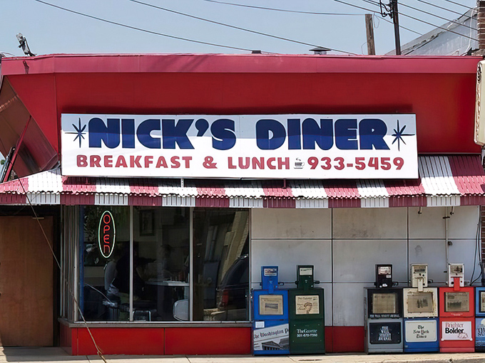 The iconic red awning of Nick's Diner stands as a beacon of breakfast hope on Wheaton's streetscape, promising simple pleasures without pretension.