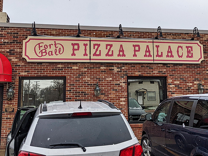 The familiar red awning of Fort Ball Pizza Palace shines like a promise to Tiffin&rsquo;s hungry crowds&mdash;no gimmicks, just unforgettable pizza.