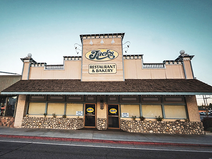 The Western-style facade of Jack's Restaurant stands like a culinary lighthouse on Bishop's main street, beckoning hungry travelers with promises of comfort food paradise.