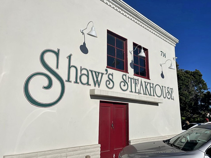 The classic white facade with that iconic red door isn't just an entrance&mdash;it's a portal to beef paradise. Santa Maria's culinary landmark stands ready to welcome hungry pilgrims.