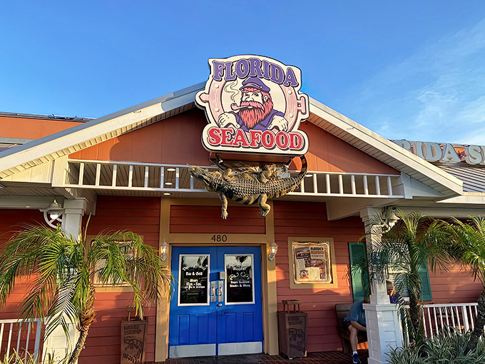 That iconic alligator sculpture isn't just decoration &ndash; it's a promise of the authentic Florida experience waiting behind those blue doors.