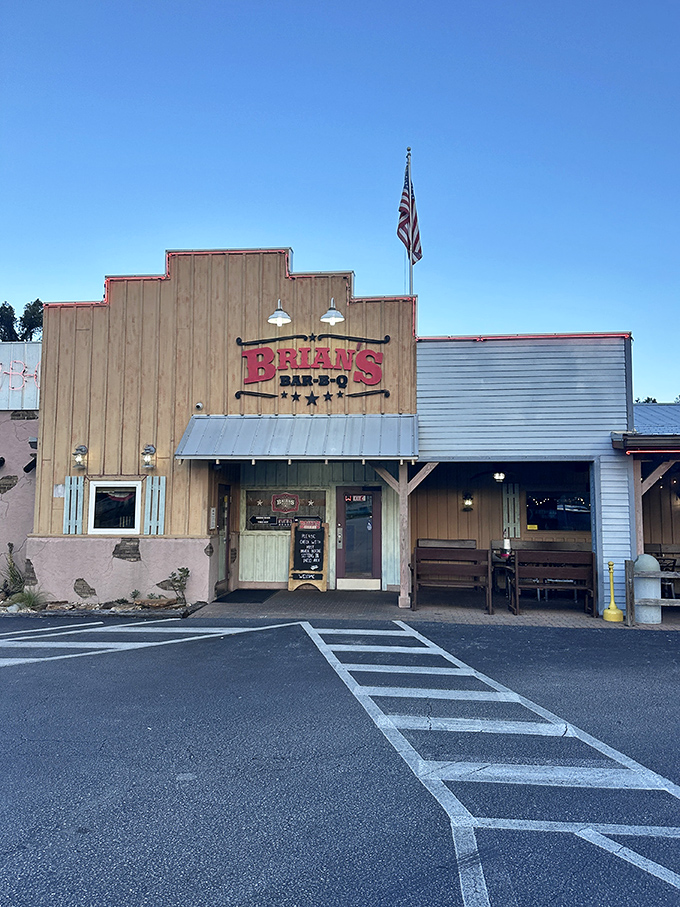 The Western-style facade of Brian's Bar-B-Que stands proudly against the Florida sky, promising smoky treasures within. No rhinestones needed when you've got substance.