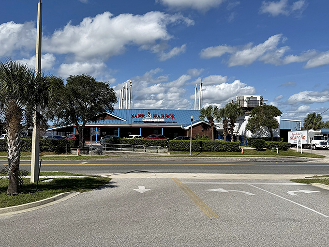 The bright blue roof of Safe Harbor stands out against Florida's sky like a beacon calling seafood lovers home.