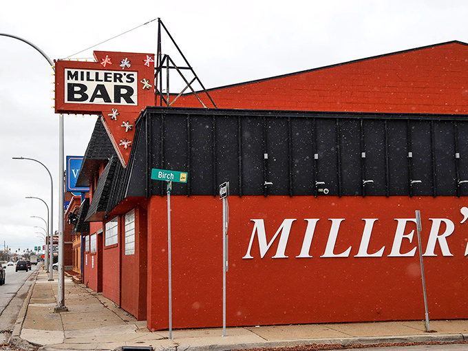 The iconic red exterior of Miller's Bar stands like a beacon of burger hope on Michigan Avenue, promising delicious simplicity without the fanfare.