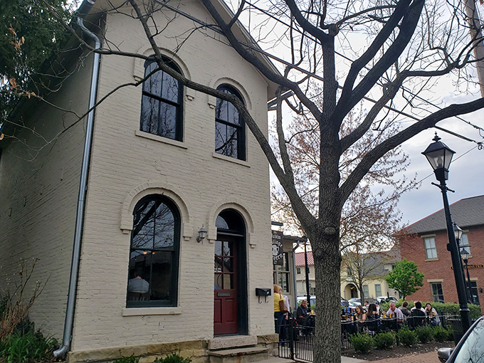 The historic cream-colored building stands like a time capsule in Dublin's historic district, its arched windows and red door promising Irish comfort within.