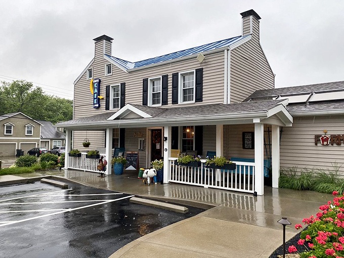 Rain-slicked walkways lead to this inviting porch, where the transition from hectic world to comfort food sanctuary begins with each step.