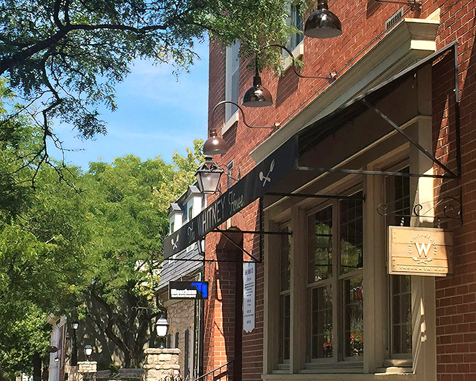 The Whitney House's charming brick exterior invites you in like an old friend who happens to be an exceptional cook.