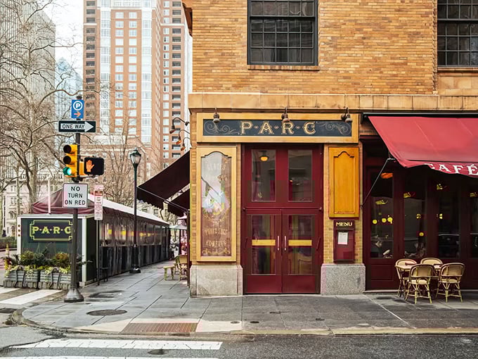 Parc's iconic corner entrance on Rittenhouse Square beckons like a Parisian postcard come to life. Those red awnings aren't just decoration&mdash;they're a promise of deliciousness within.