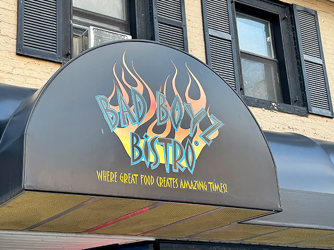The flame-adorned sign promises adventure for your taste buds. Bad Boyz Bistro's unassuming exterior hides culinary treasures waiting to be discovered.
