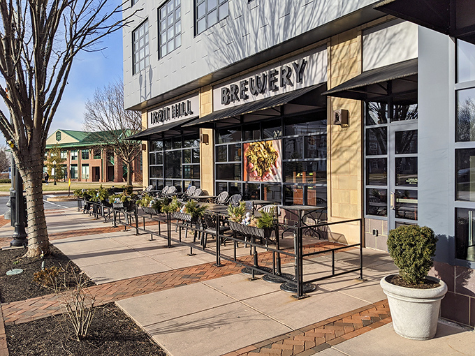 The modern fa&ccedil;ade of Iron Hill beckons with its inviting patio, promising craft beer nirvana and burger bliss just steps from Lancaster's bustling streets.