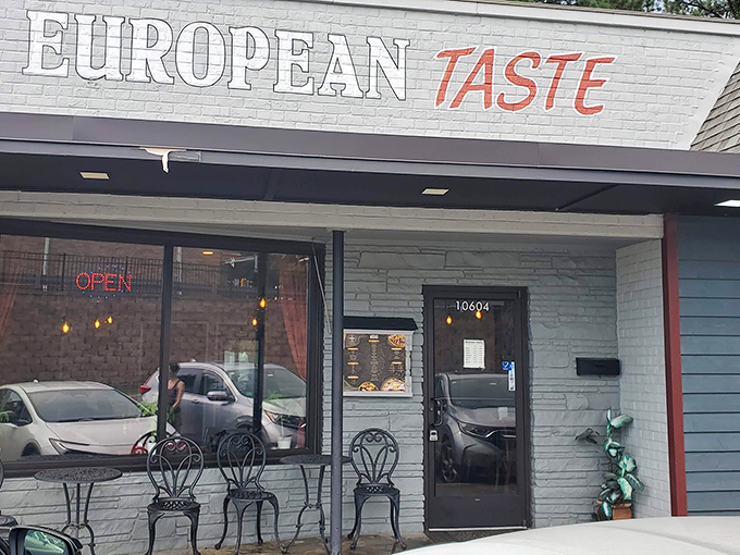 The unassuming storefront of European Taste beckons like a culinary secret waiting to be discovered. White brick, red lettering, and endless possibilities behind that door.
